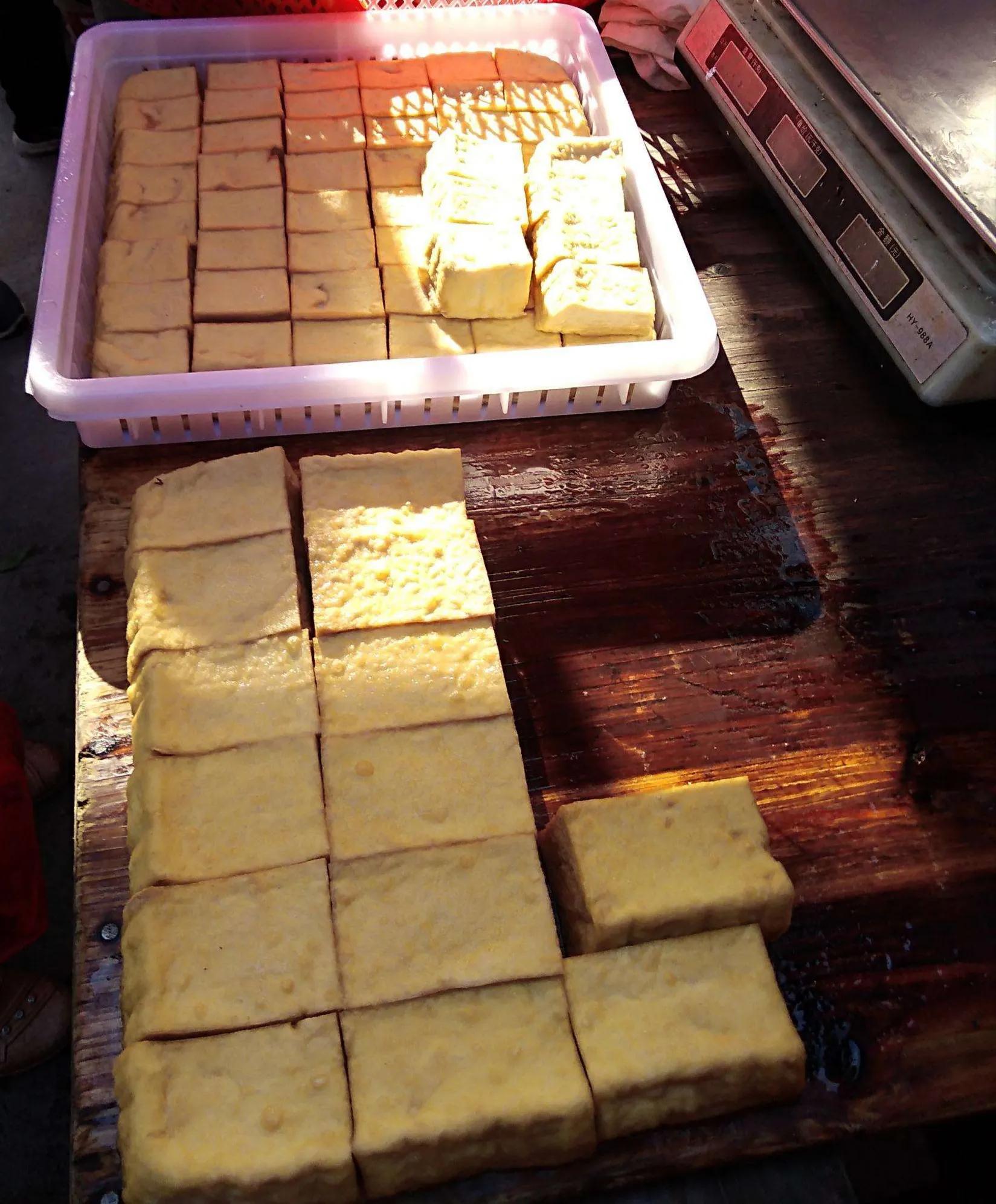 On the twenty-fifth day of the twelfth lunar month, tofu is made by ...