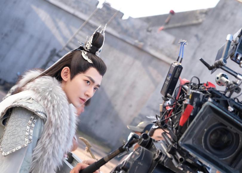 Deng plays the young general's imposing manner for "Long Moon Ember ...