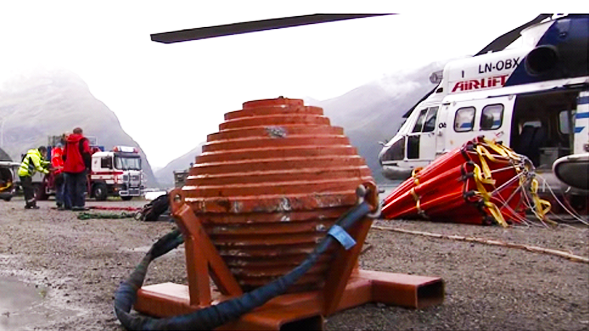 Efficiently clearing the falling rocks on the hillside, the helicopter ...