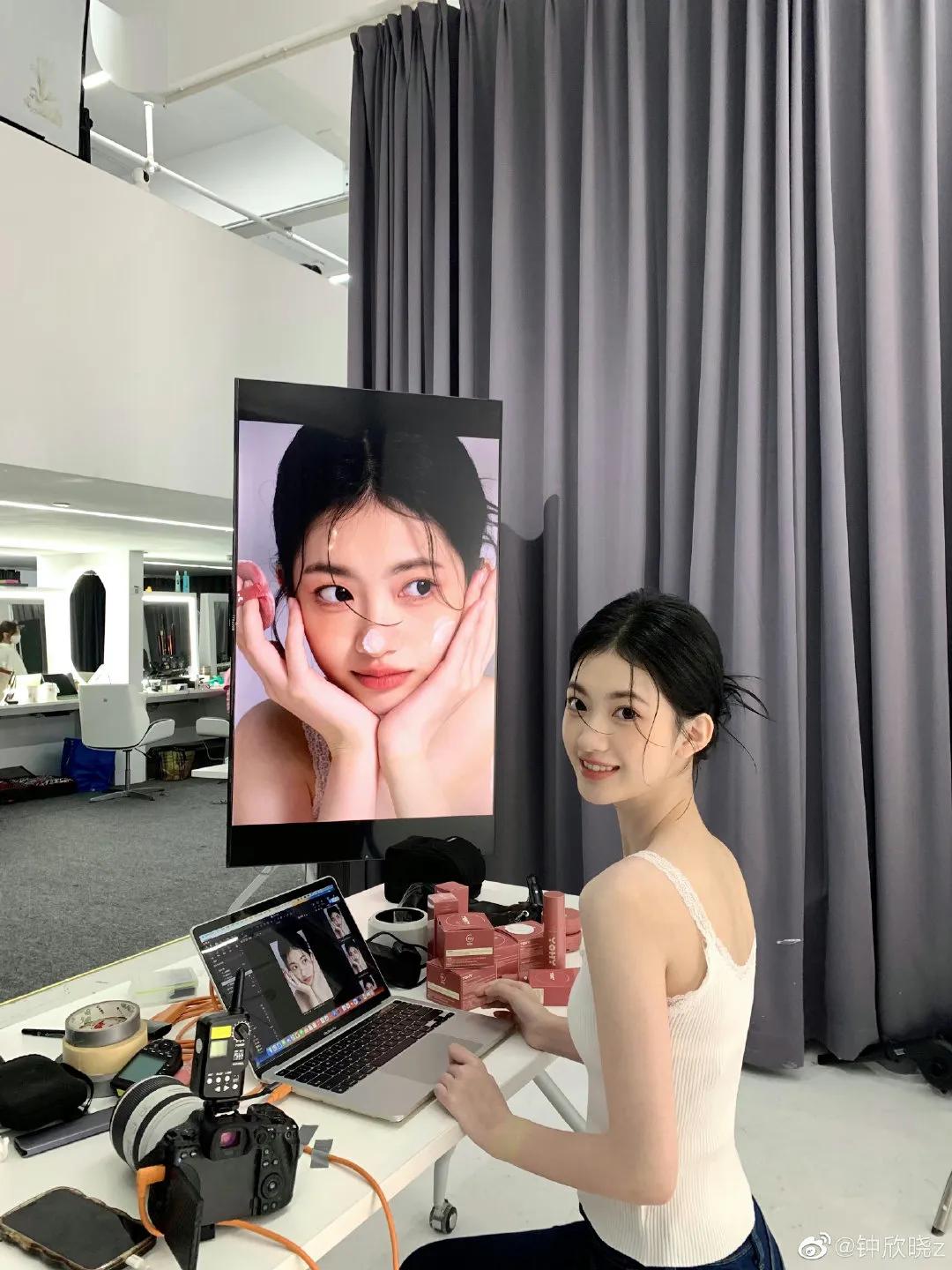 The beautiful model looks the same as the refined poster, with ...