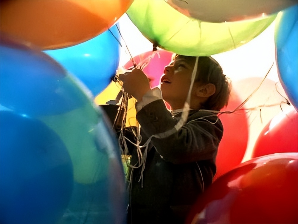 Like a star, the red balloon caught Pascal's attention, and their ...