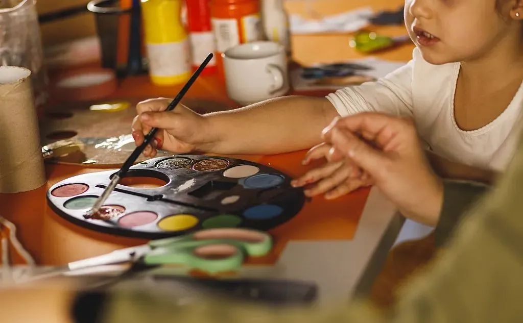 Childlike fun, happy painting of mountains and rivers, creative hand ...