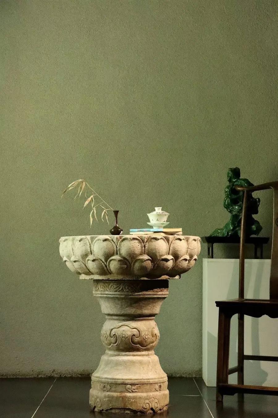 The bluestone lotus Buddha sits on this vessel. The workmanship is very ...