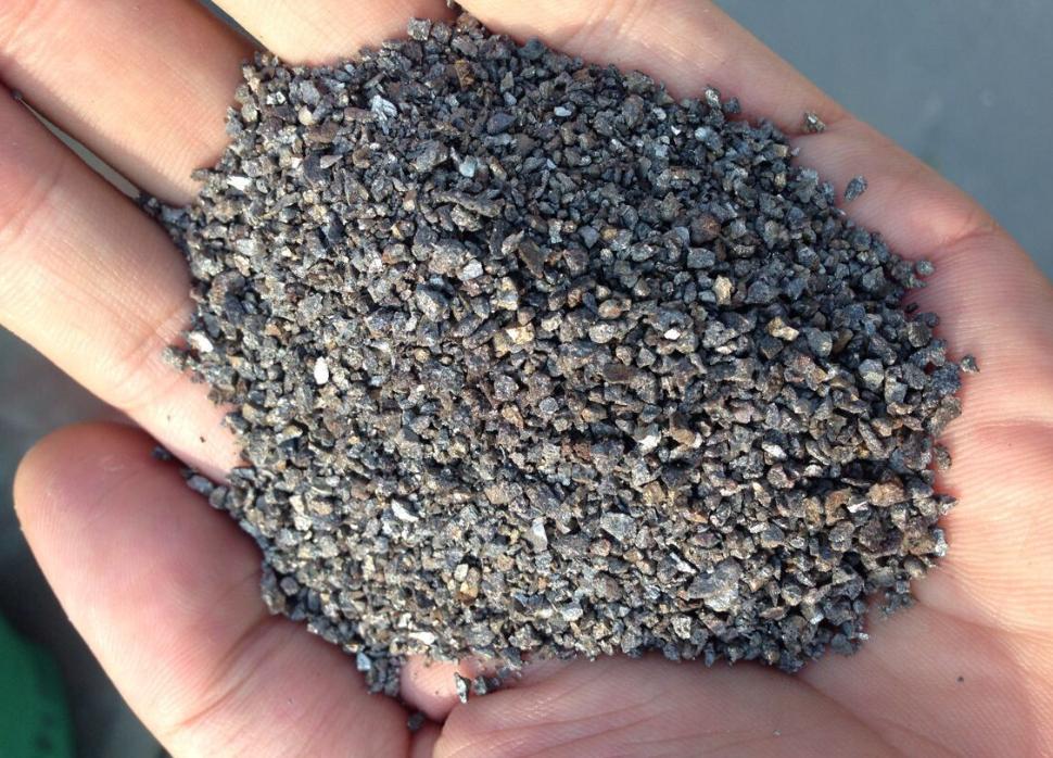 The little black spots on the beach turned out to be iron ore ...