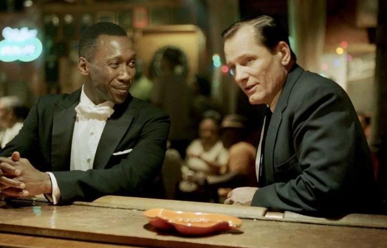 How does "Green Book" raise social issues and convey social values ...