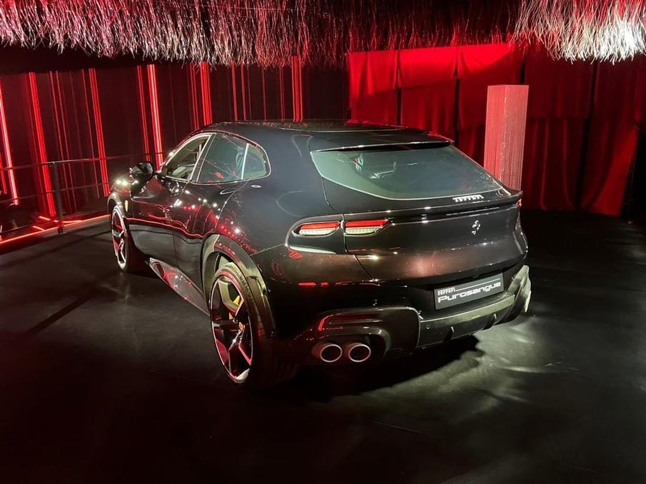 The frameless side doors are beautiful in black and the new Ferrari ...