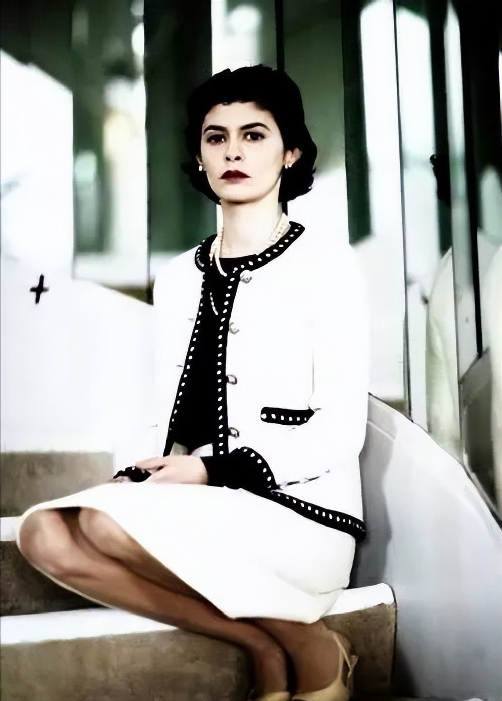 Taking the movie "Chanel, Queen of Fashion" as an example, discuss the ...