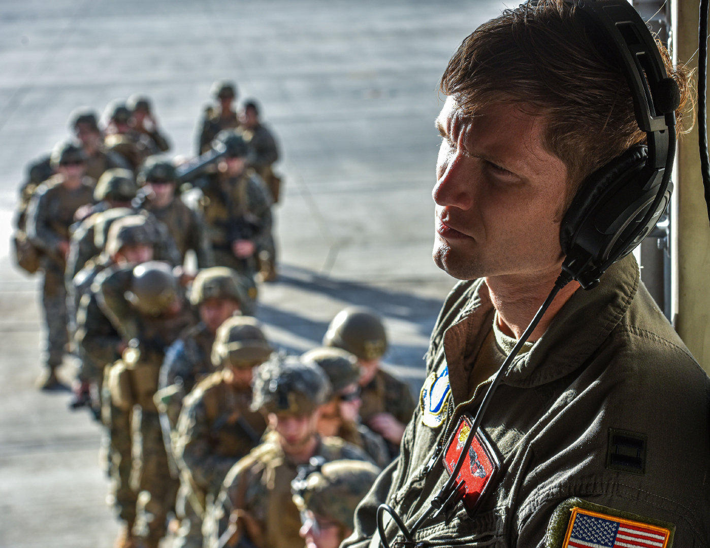 535th Airlift Squadron unloads cargo and personnel at Pacific Missile ...