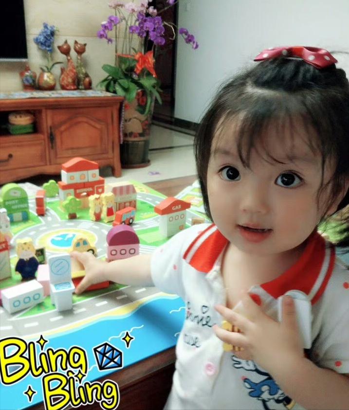 Seven years ago, a recent photo of a 4-year-old girl, Ala Lei, who ...