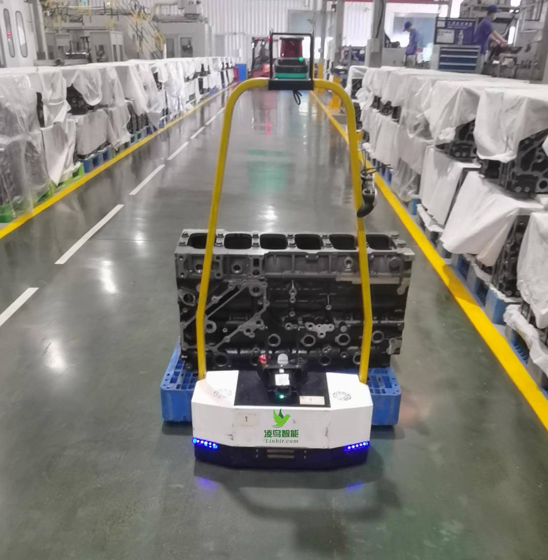 An integral part of the smart factory - AGV handling robot solution ...