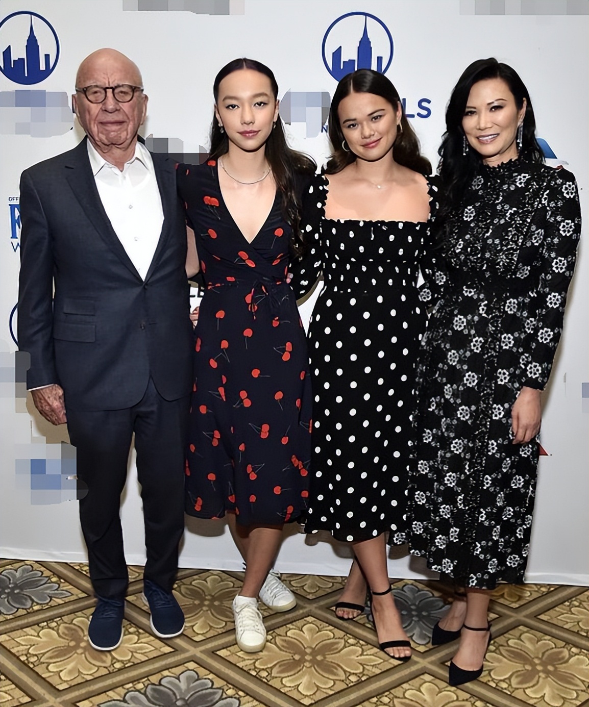 Wendi Deng showed up with her daughter. The floral skirt and curly hair ...