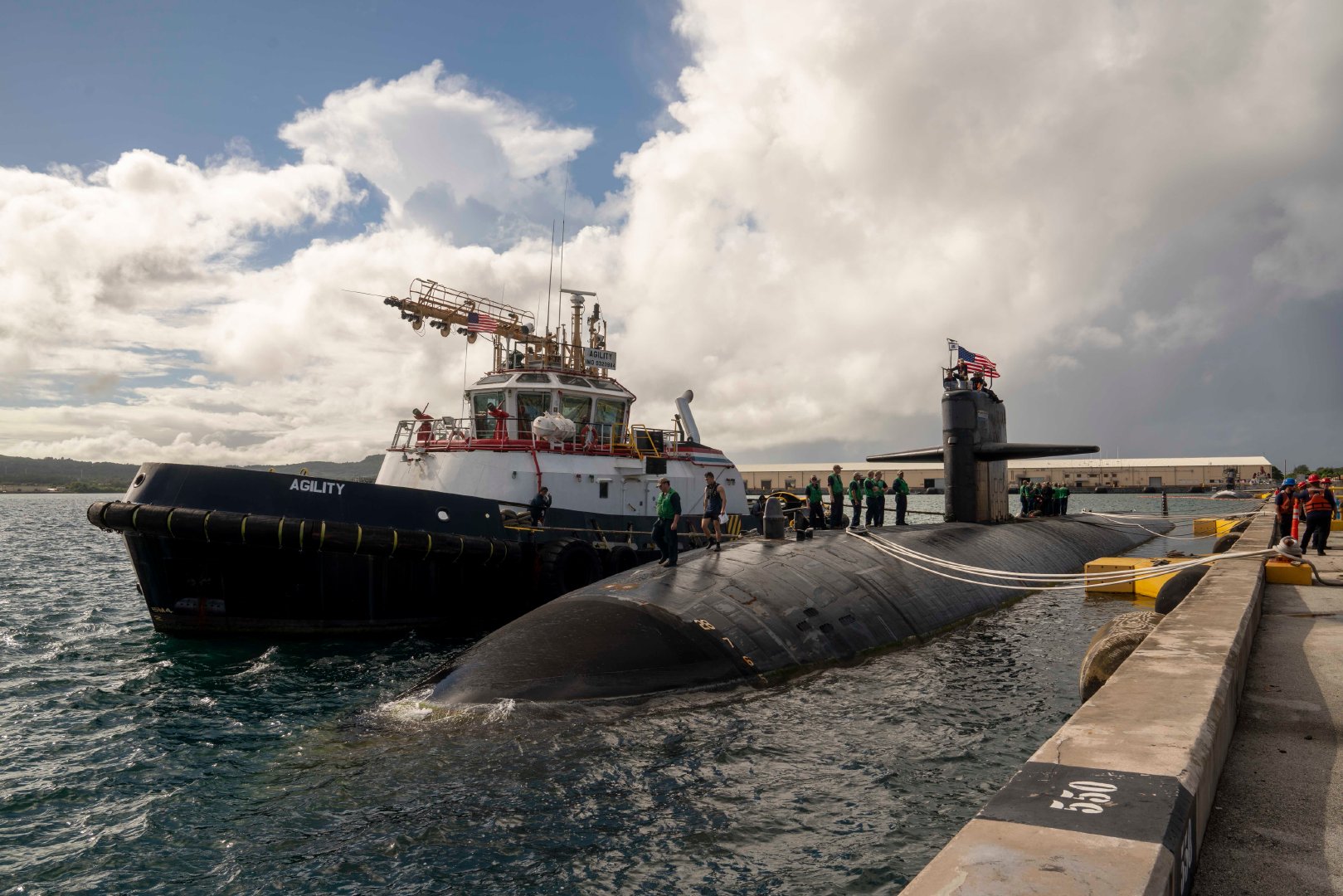 The fast attack submarine USS Key West (SSN 722) left Apra Harbor, Guam ...