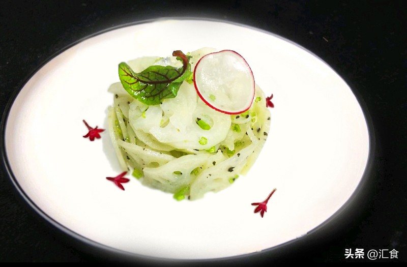 Beef in golden soup, amber duck tongue, black truffle mixed with lotus ...