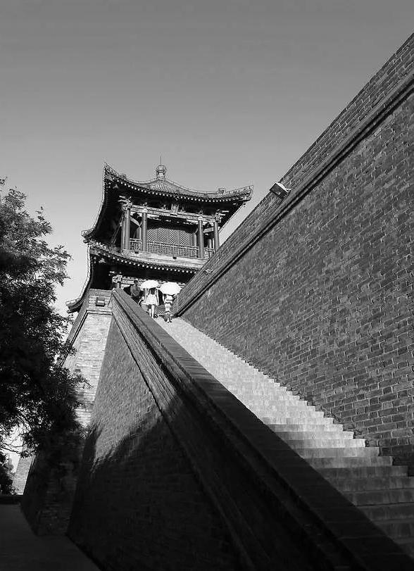 The grass and trees in front of the gate have turned blue and green ...