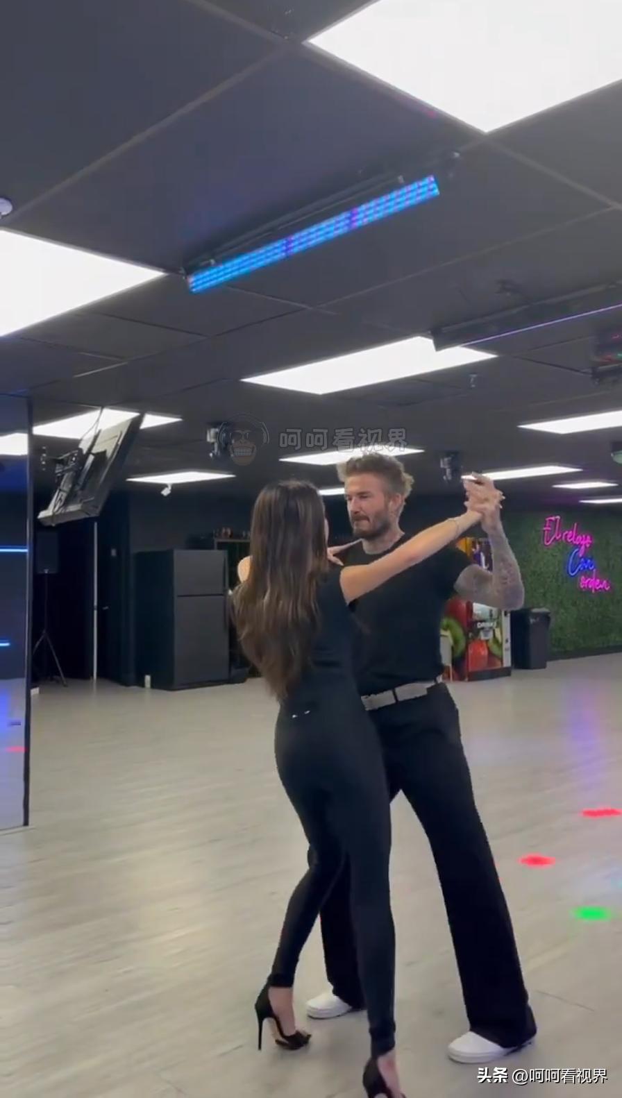 Beckham and Mrs. Beckham show off their dancing postures, one is full ...