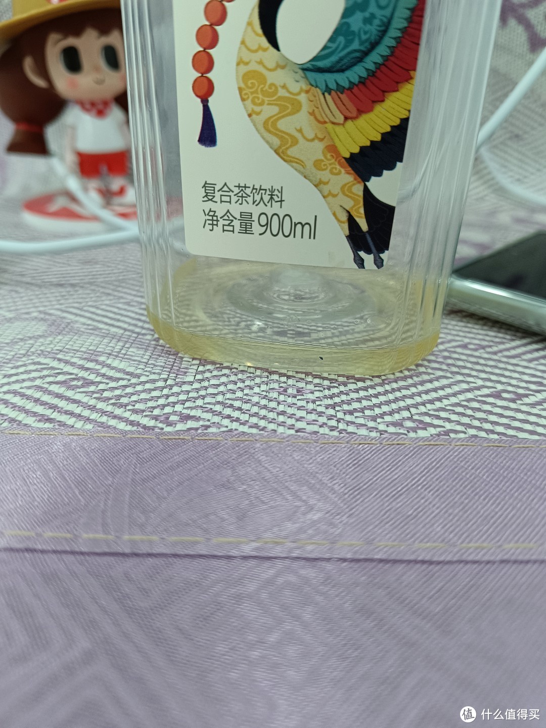 A 900ml bottle of green mandarin puer is quite delicious - iNEWS