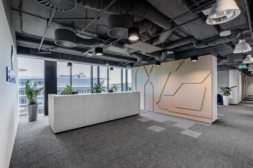 Minimalist industrial aesthetic space Emerson Warsaw headquarters ...