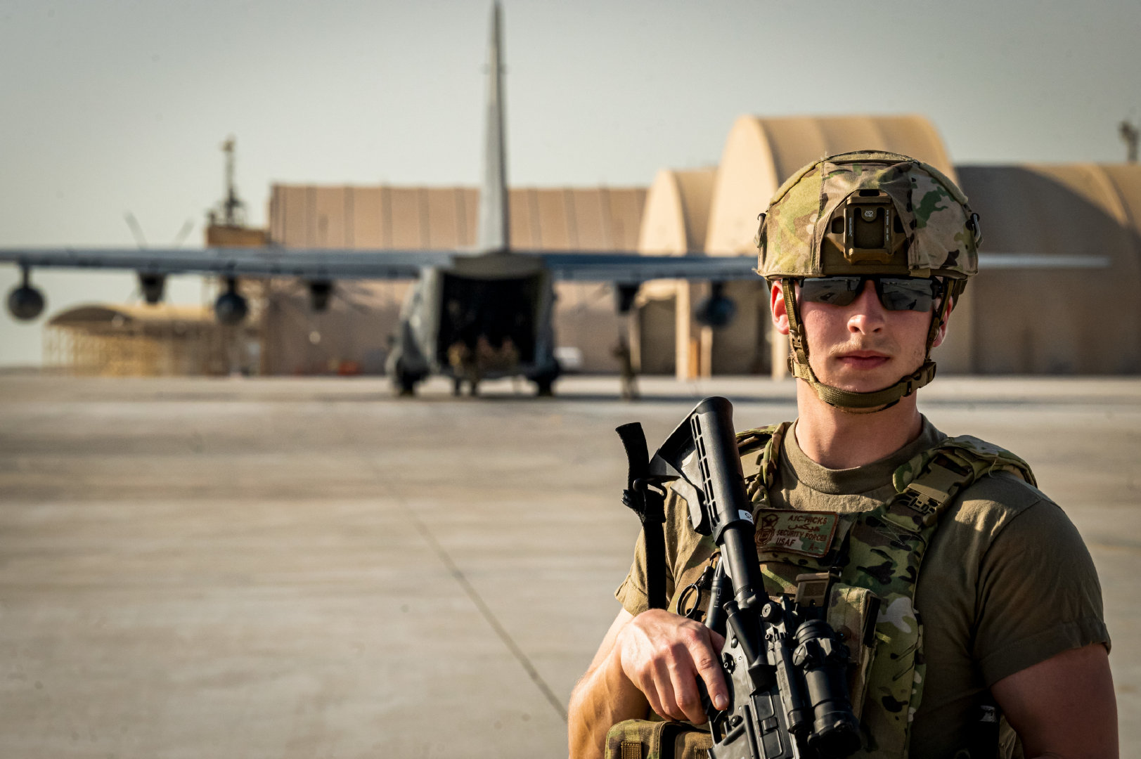 U.S. Air Force Guards MQ-9 Reaper on Airstrip - iMedia