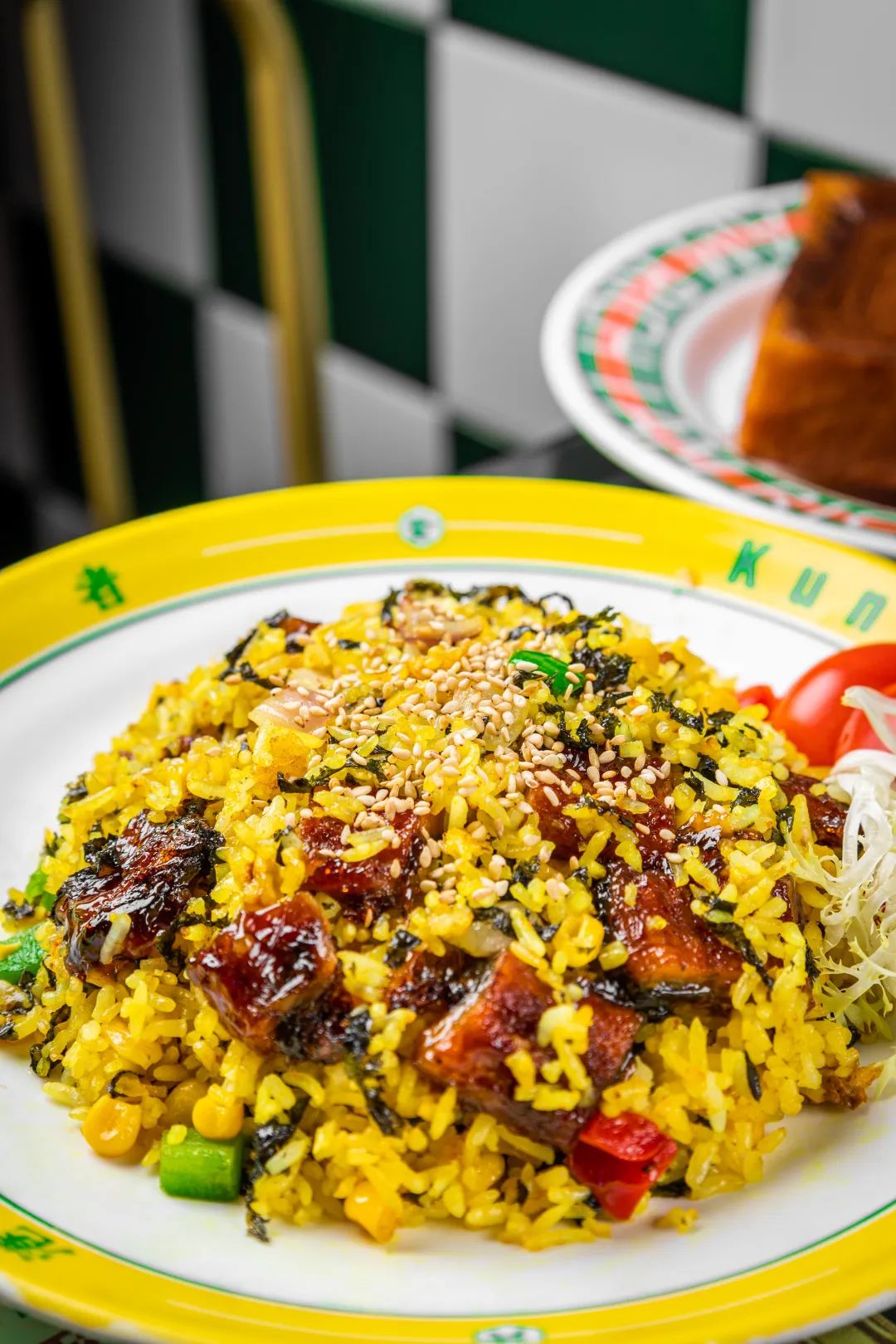 The Hong Kong version of curry chicken chop rice is golden in color ...