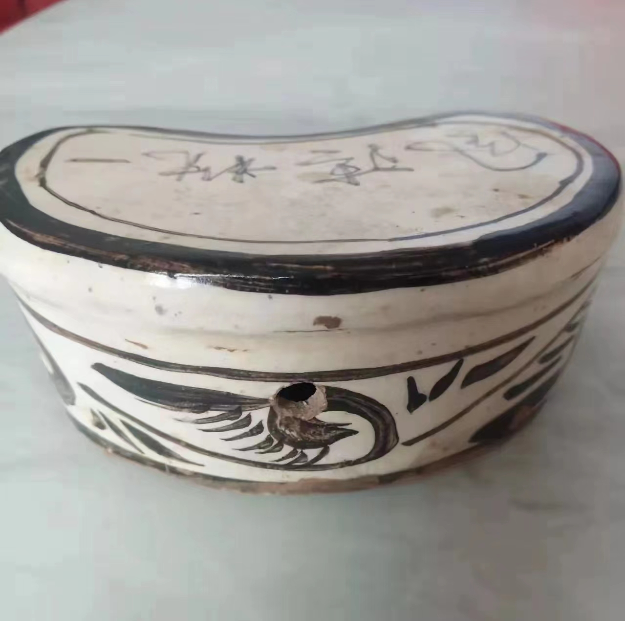 Appreciation of a pillow of Qingfeng waist-shaped pillow in Cizhou Kiln ...