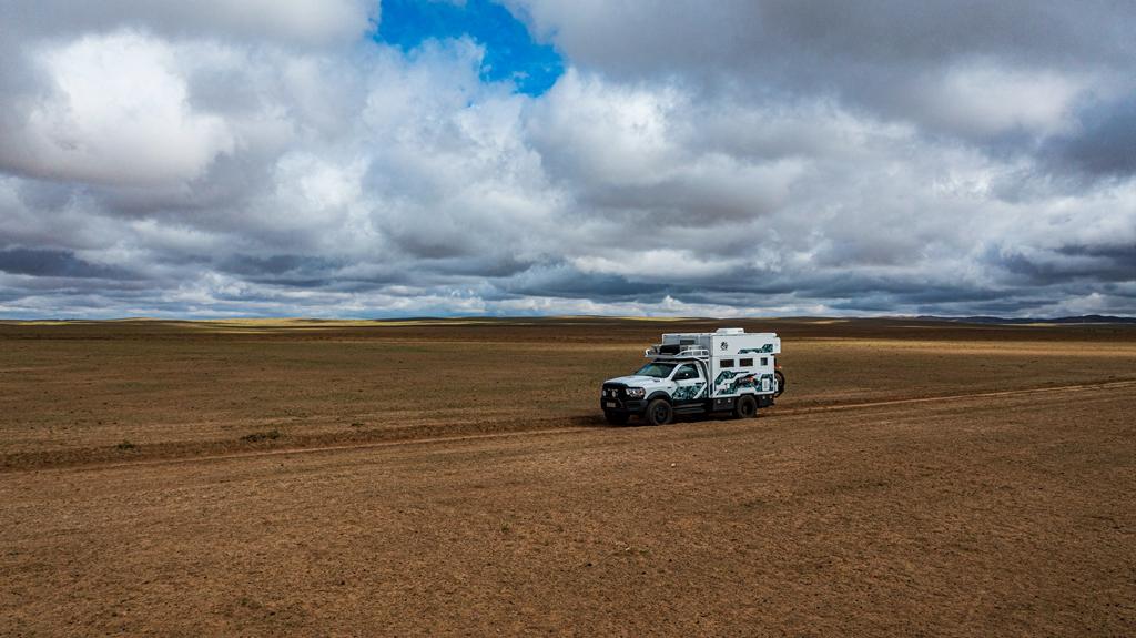Ram 5500 Earth Wanderer 4WD off-road RV as a home in the landscape - iNEWS