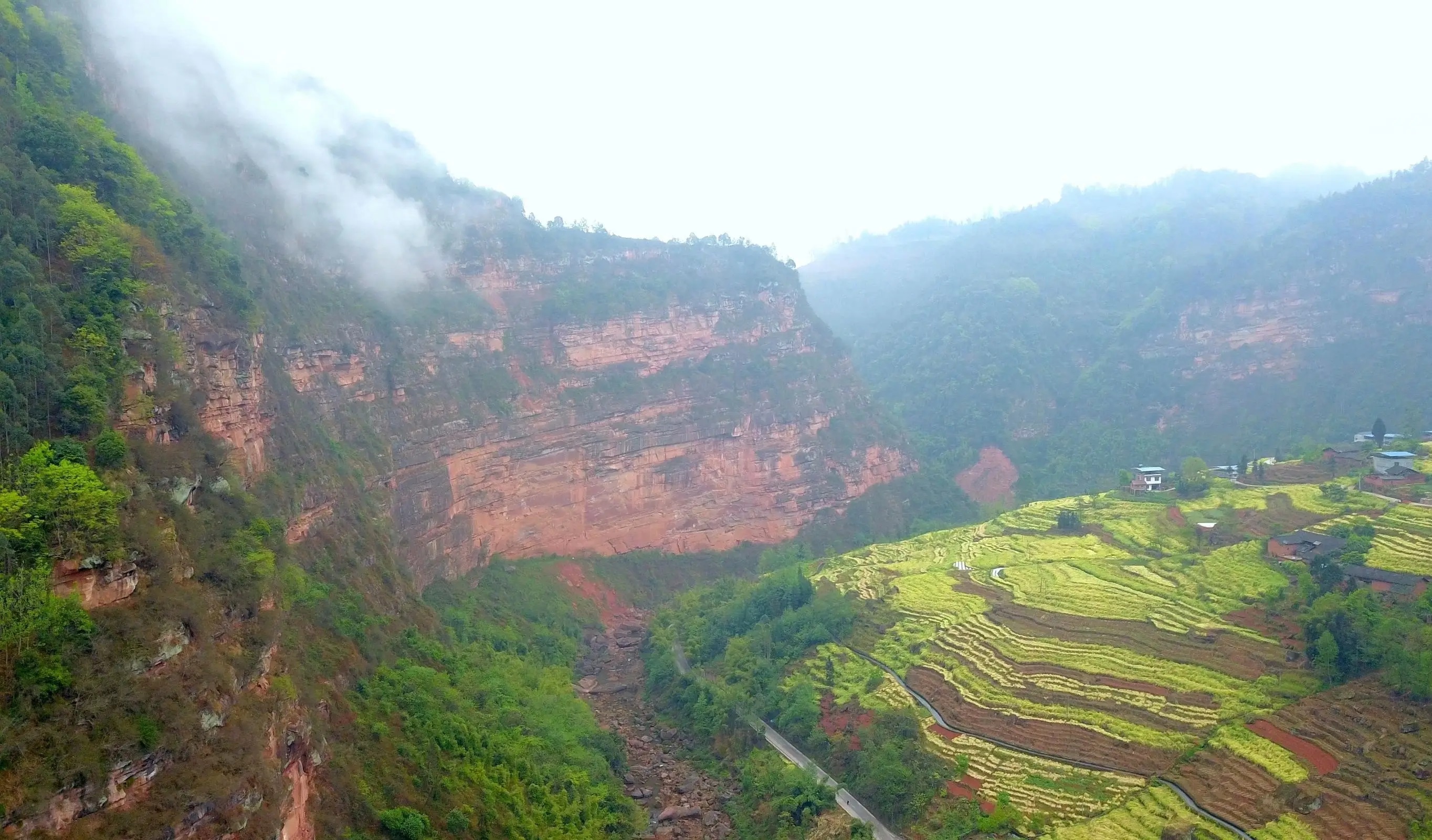 "Ring Cliff Danxia" is a unique annular Danxia landform, featuring an ...