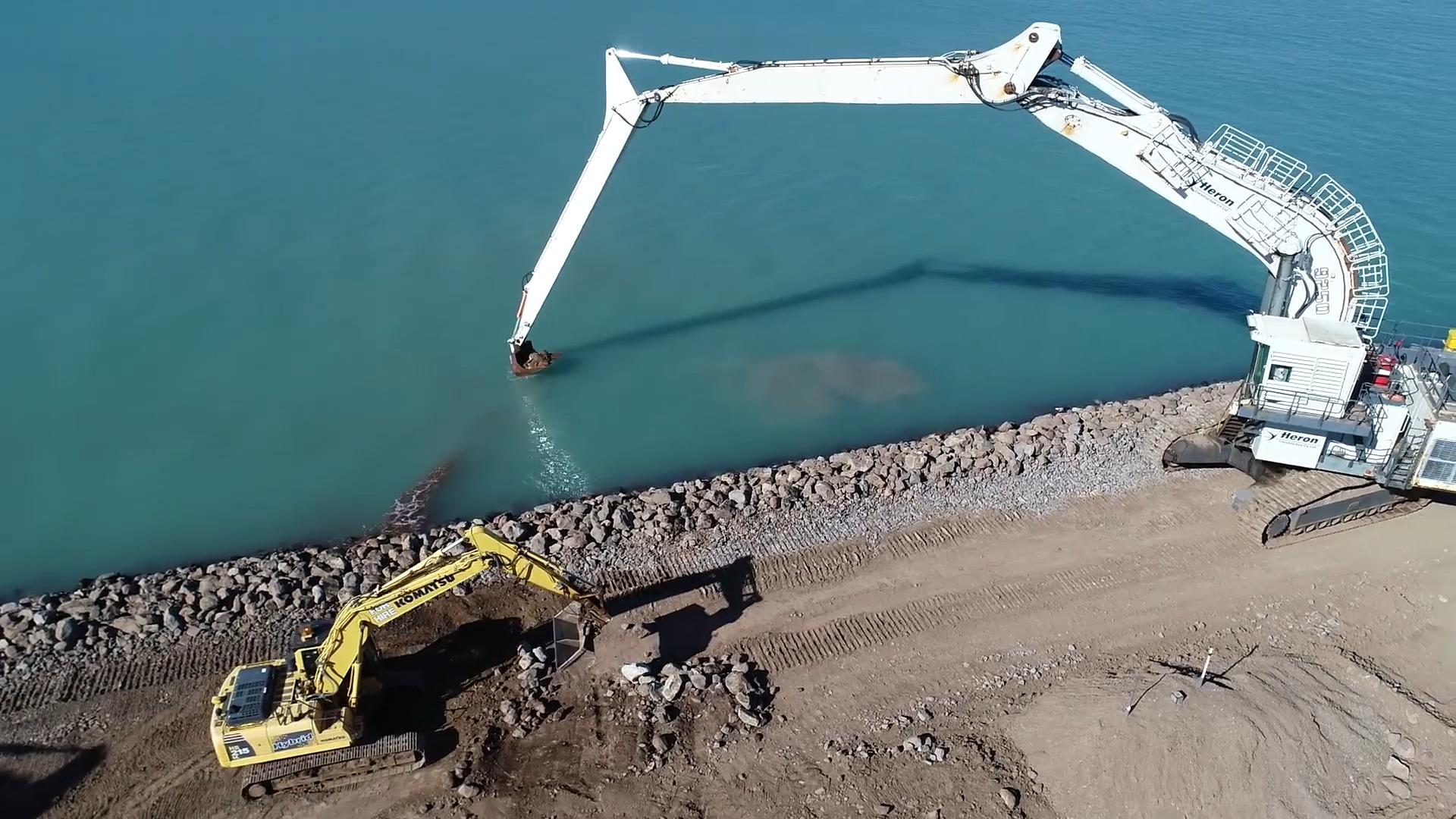 The arm is 42 meters long, and stones can be accurately buried in the ...