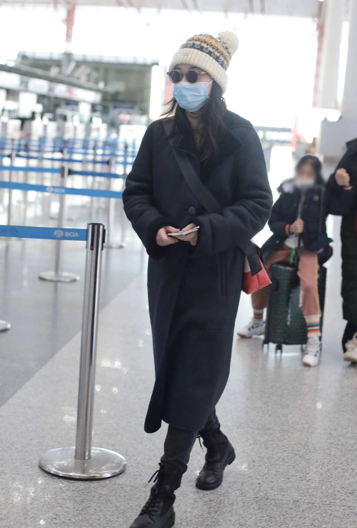 Mei Ting's family of four rarely share the same frame, their children ...