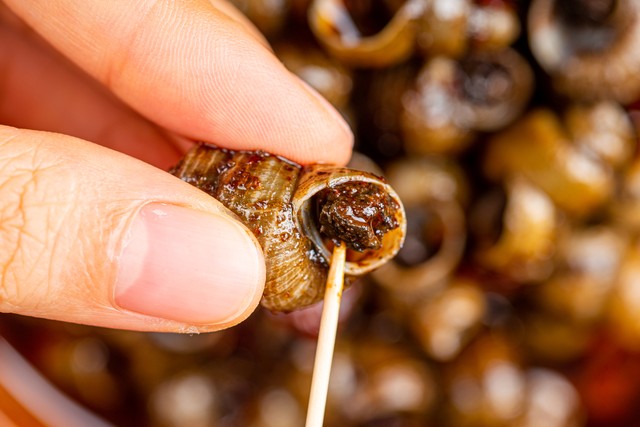 There is a secret to delicious fried escargot. The chef will teach you ...