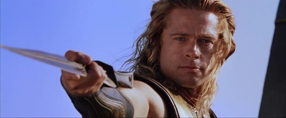 In the movie "Troy", what is the theme that the director wants to ...