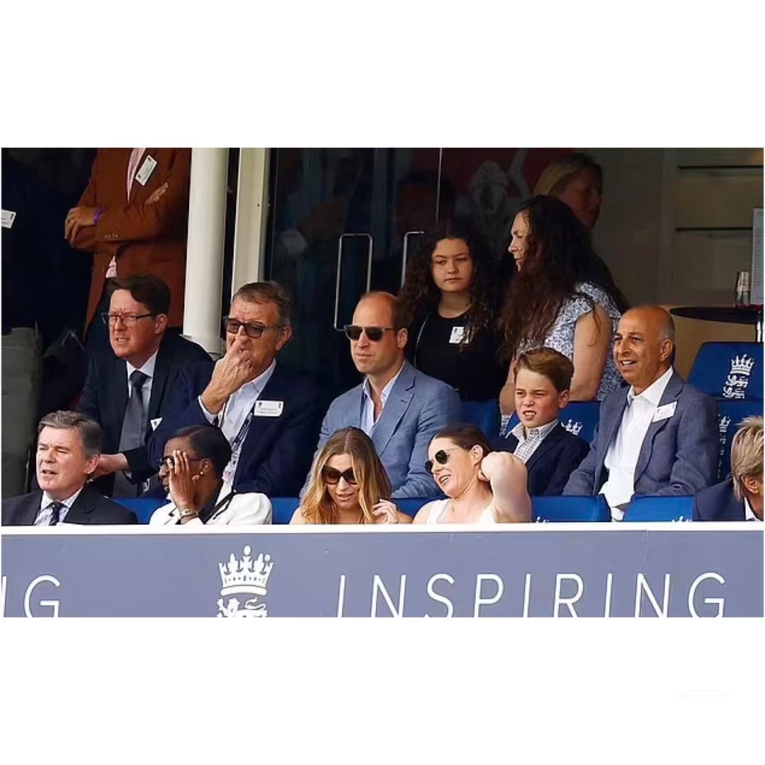 Prince William and his son are watching the football game. The father ...