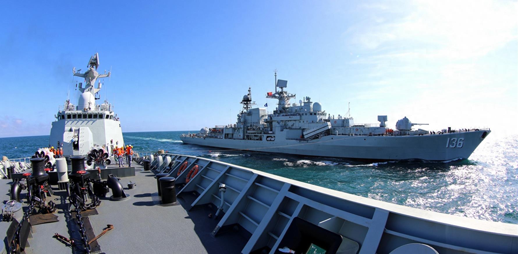 More than 20 warships moved closer to the aircraft carrier. The Chinese ...