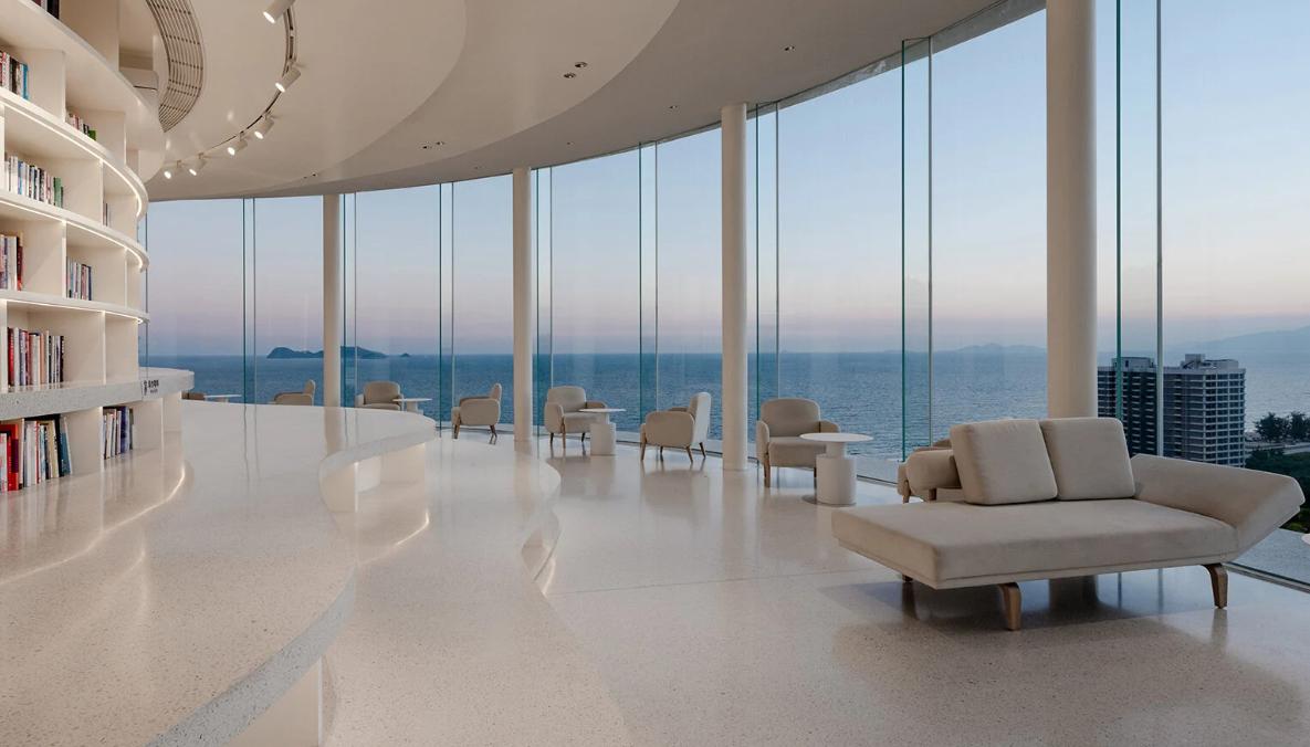 The design of this white circular library presents a poetic beauty - iNEWS