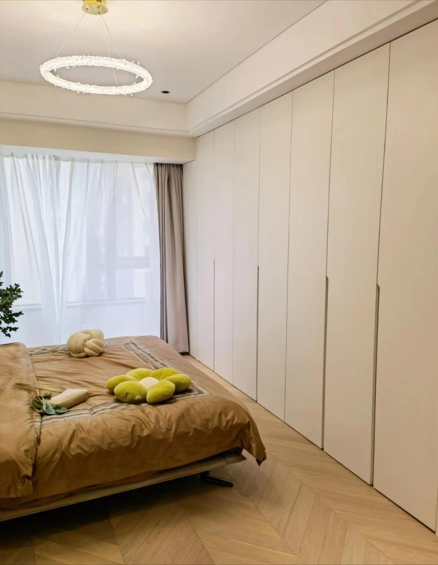 The custom-made wardrobe is both internal and external, with a high ...