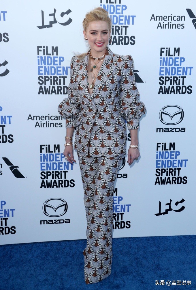 Amber Heard wears a sheer dress to the premiere of her new movie ...