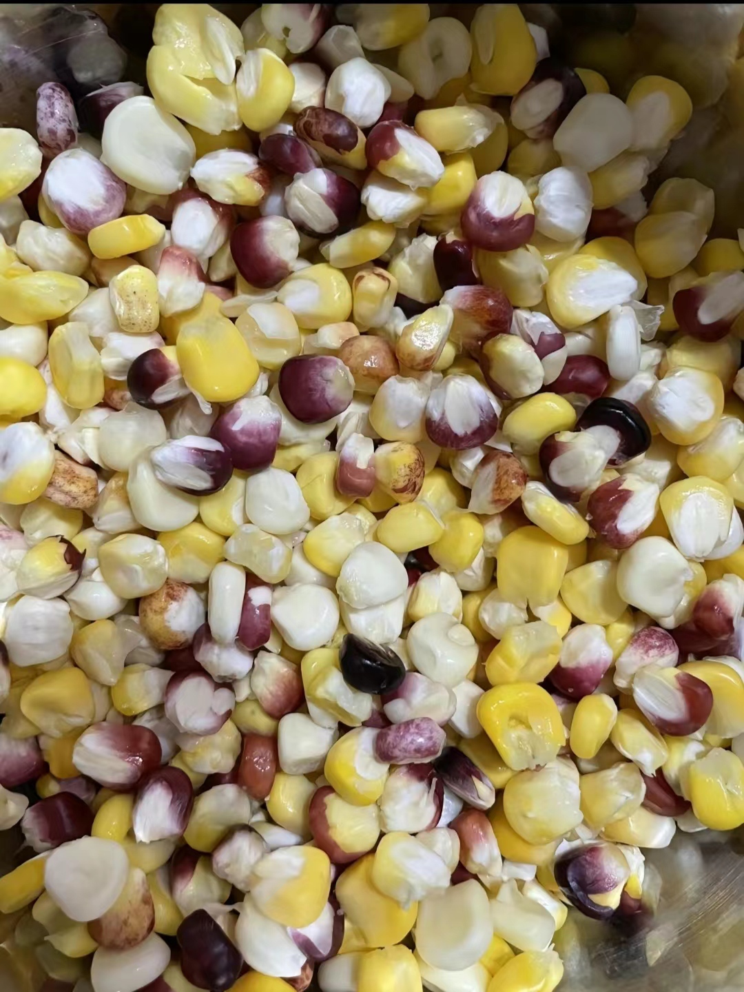 "Peel off the corn kernels and squeeze the juice for the children to ...