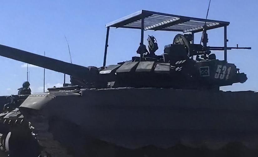 People's Liberation Army tanks have metal nets on their heads. Do you ...