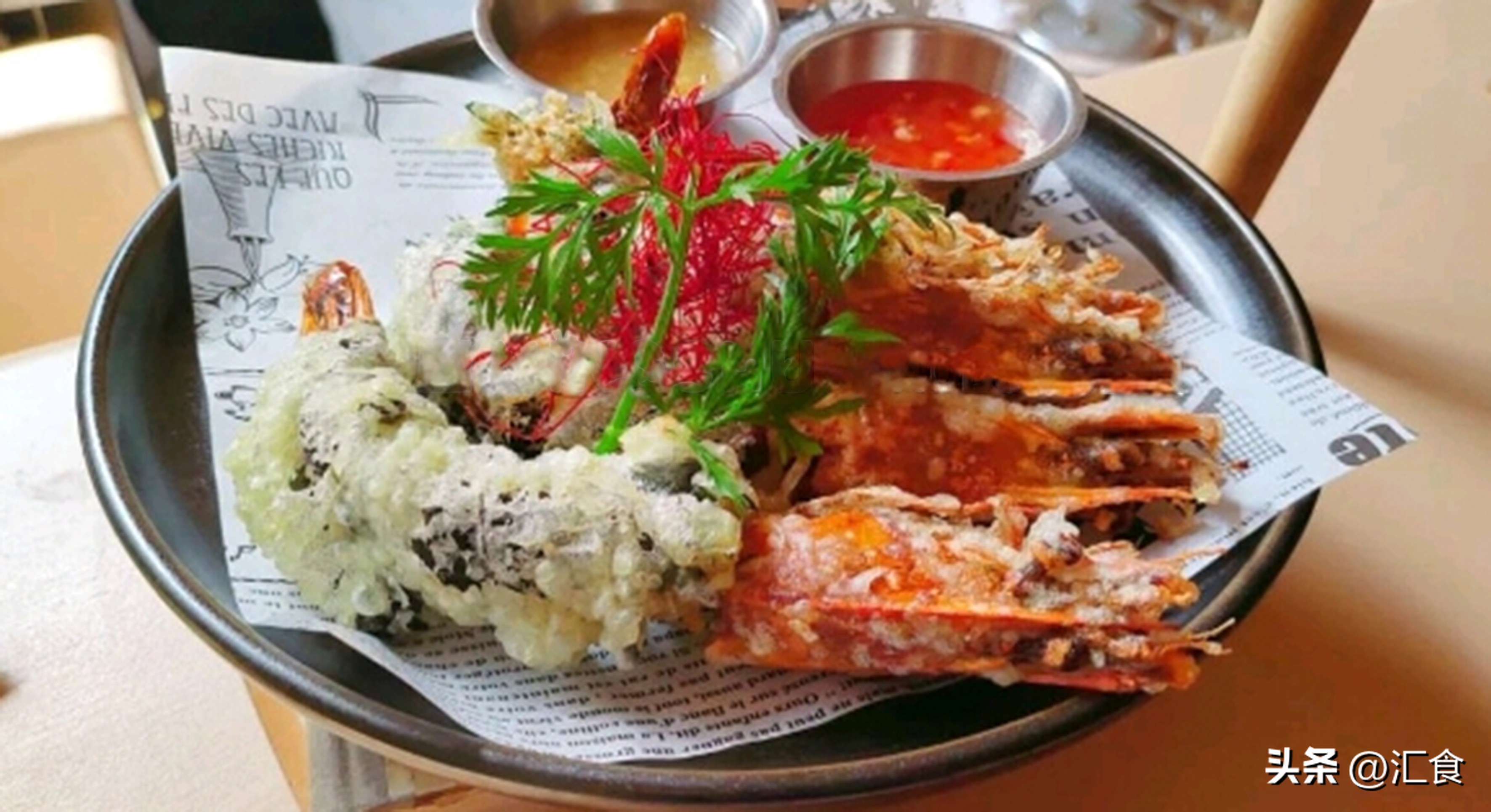 Crispy pork fillet, tempura seaweed prawns, pea puree and small ...