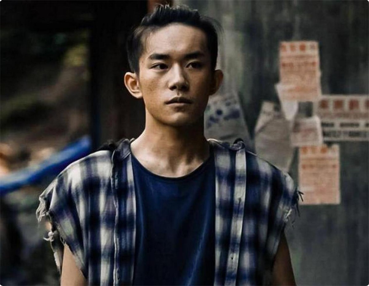 The "perfect male god" is fake, with a craggy face and acne marks, and ...