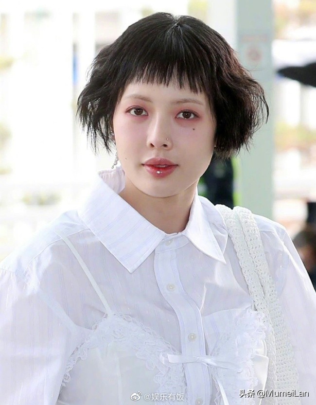 Hyuna appeared at the airport with short hair - iMedia