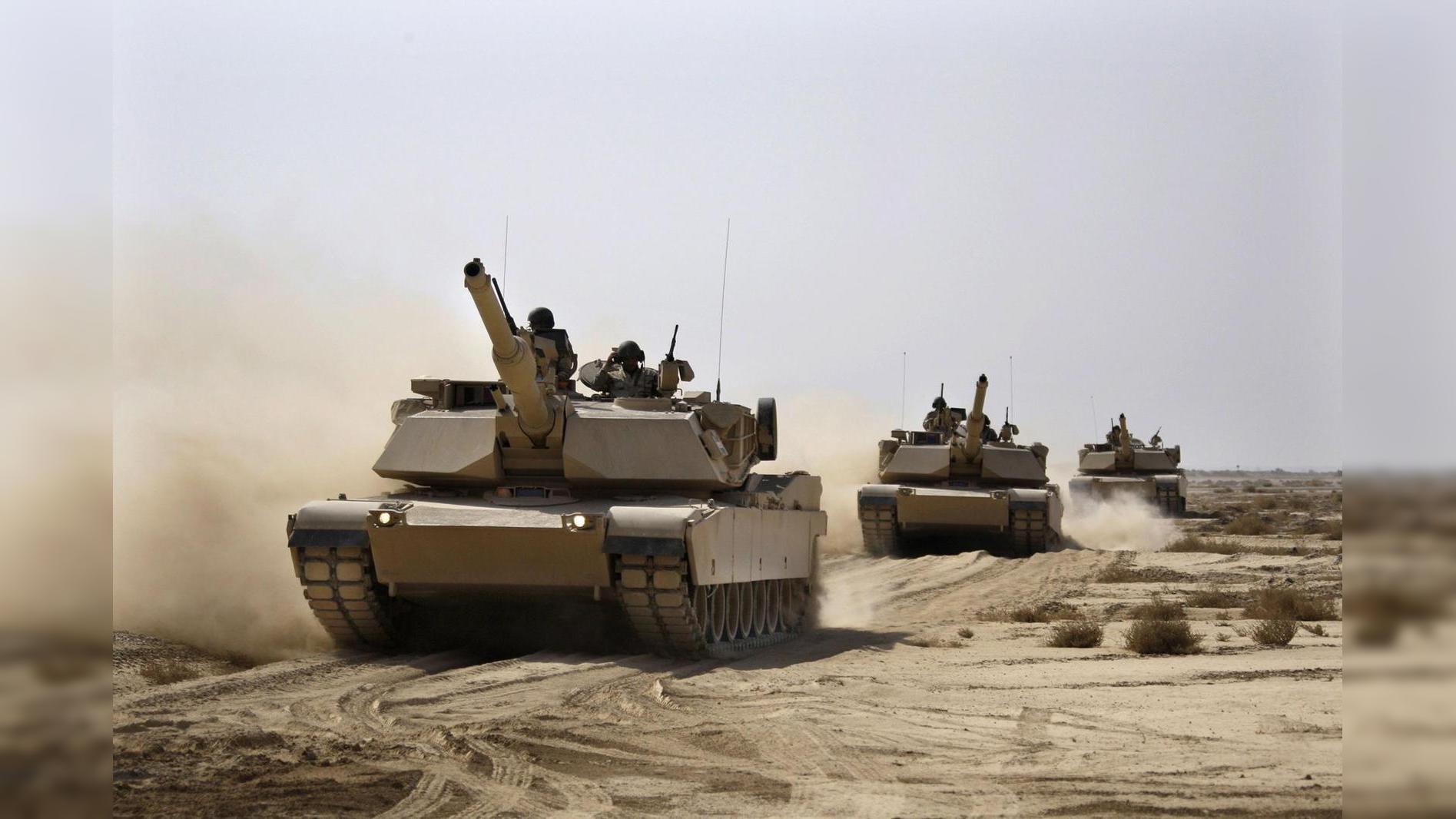 Comparing the number of tanks in a division of China, the United States ...