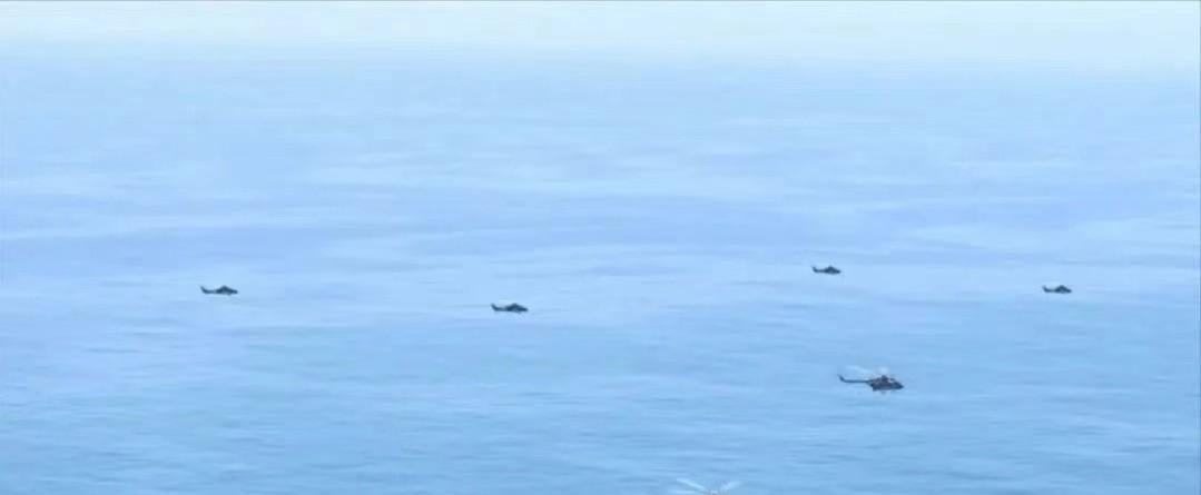 The army aviation fleet skimmed the sea at ultra-low altitude, and ...