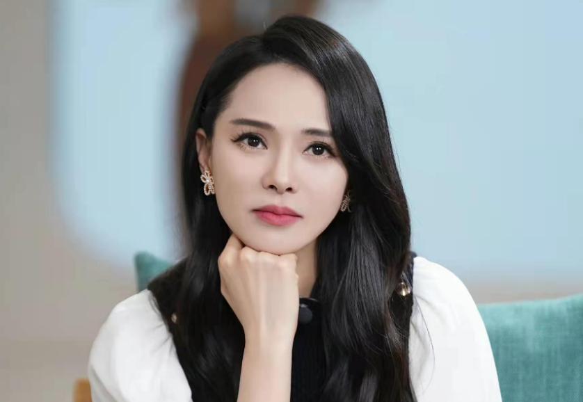 The face is rugged, the cheekbones are prominent, and the mouth is ...