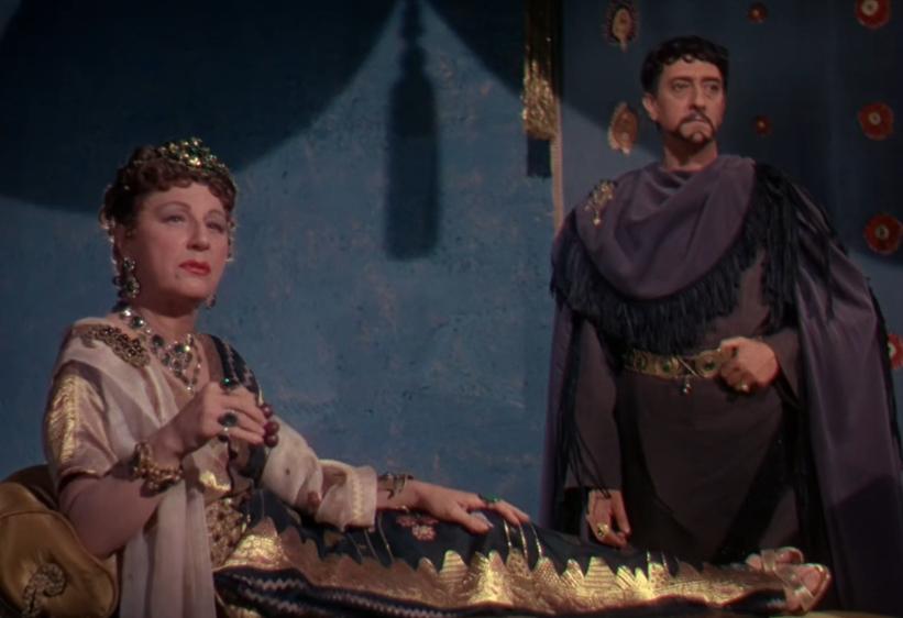 How does Hayworth's performance of "Salome" convey the emotional charm ...