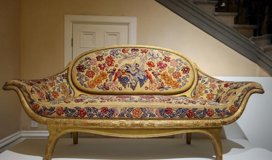 Nearly 100-year-old sofas, furniture, and clothes are unpacked at the ...