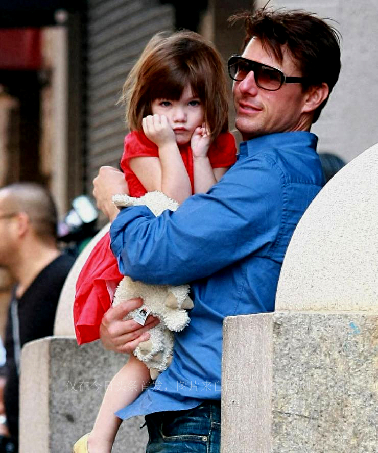 17-year-old Suri is fair-skinned and beautiful, and is taller than Tom ...