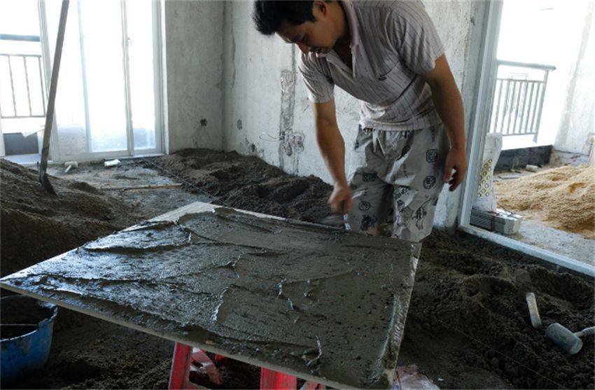 What is the difference between dry laying and wet laying of tiles? When ...