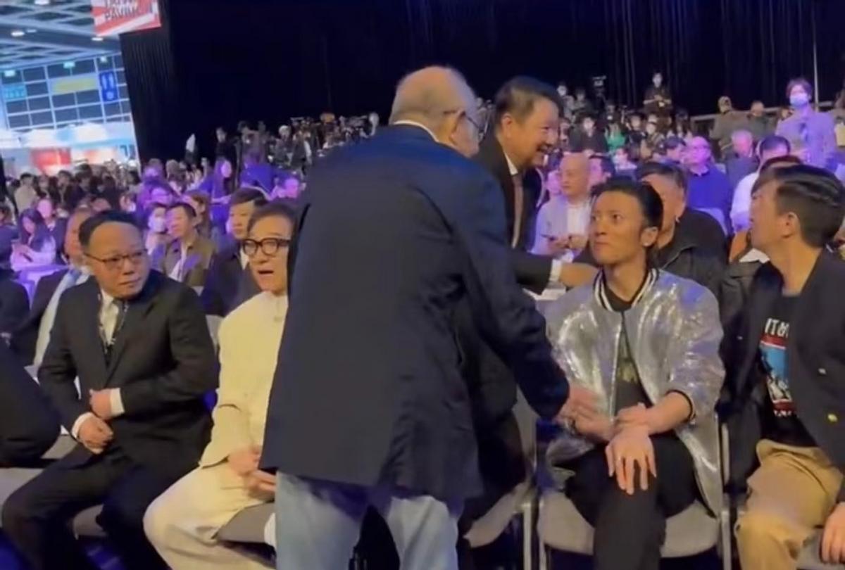 Jackie Chan, Nicholas Tse, Jacky Cheung, and Zhang Jiahui sat side by ...
