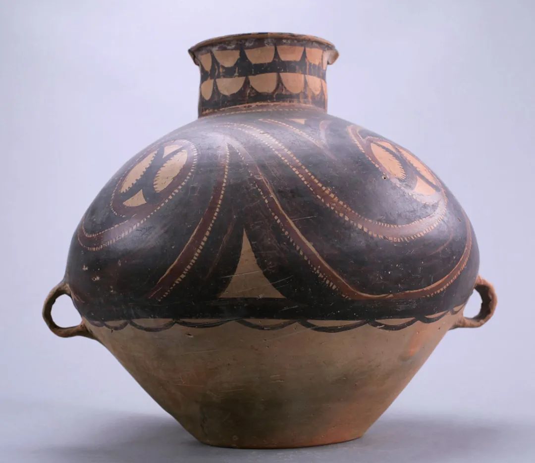 Painted pottery vase with spiral pattern and pointed bottom: the ...