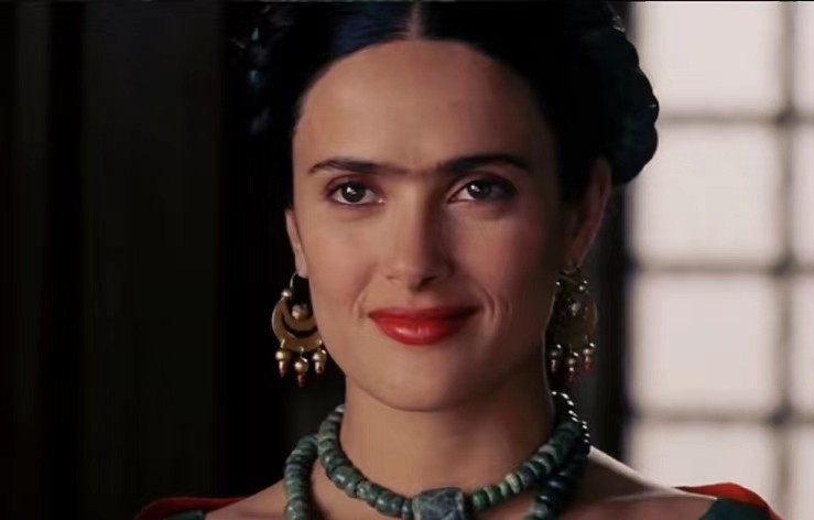 What is the role of the use of song, dance and color scenes in the ...